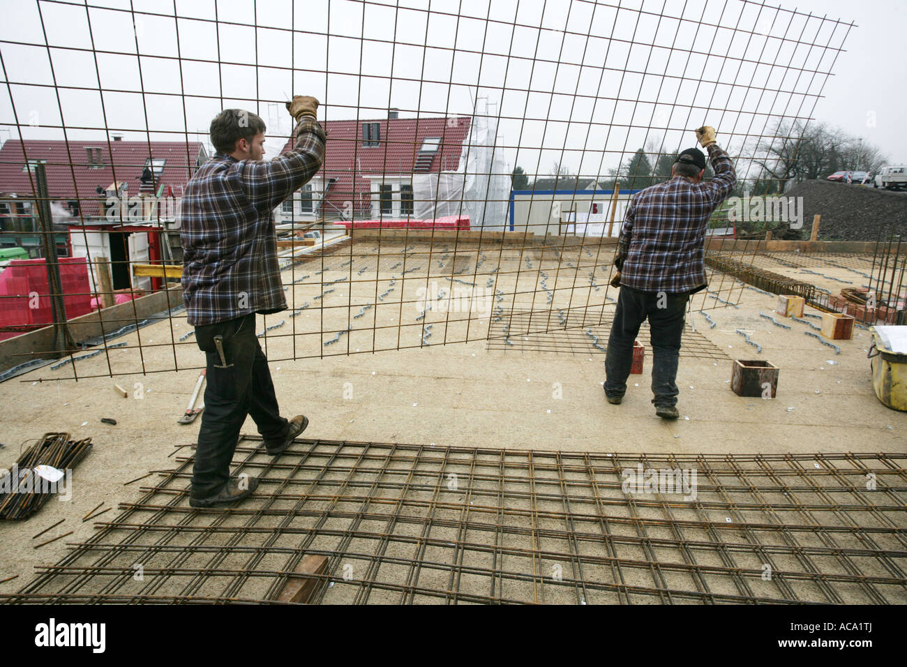 Rebar Workers Installing Reinforcing Mat For An Apartment House Essen