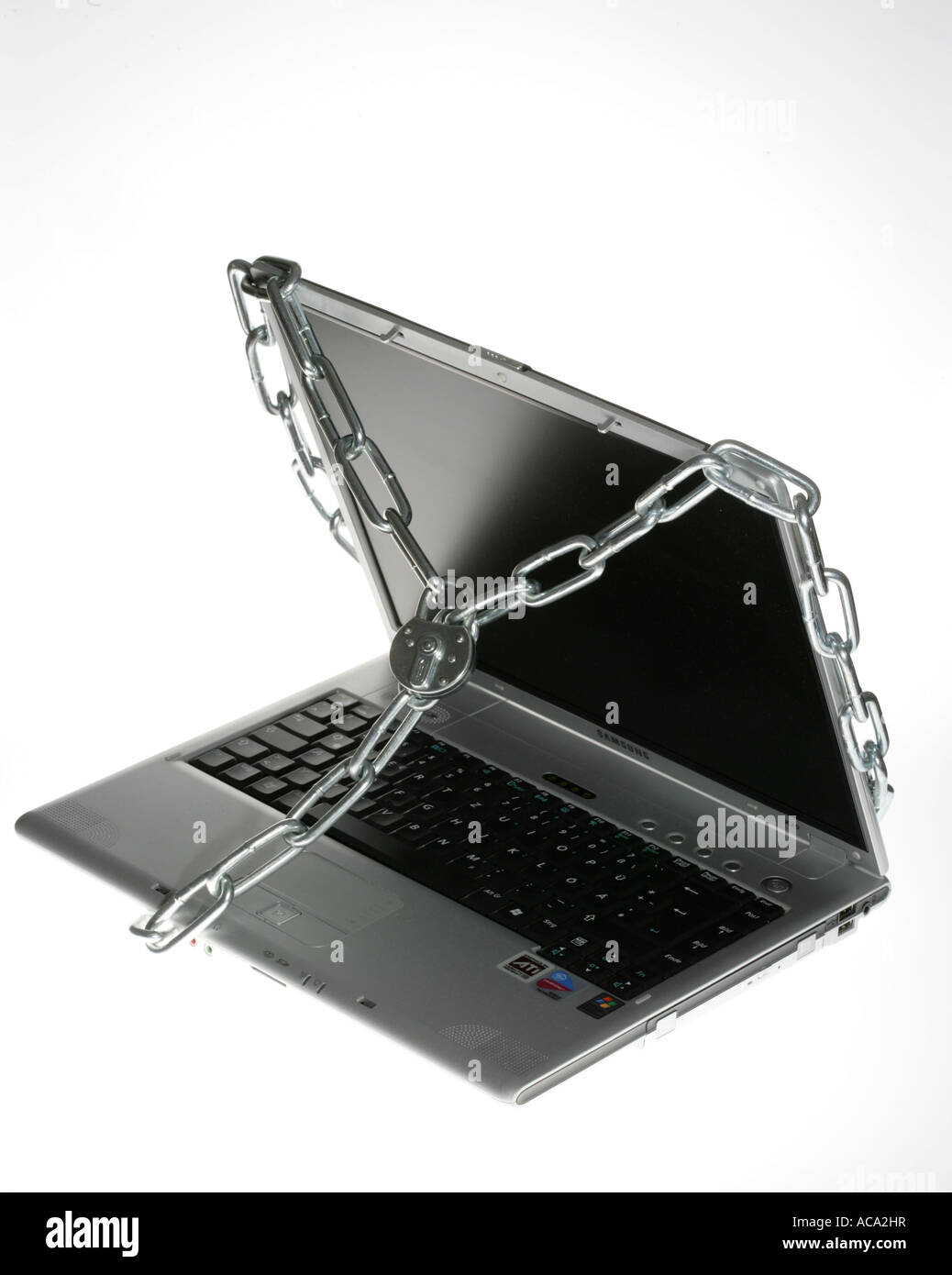 Symbolic photo, computer safety, Laptop computer in chains Stock Photo ...