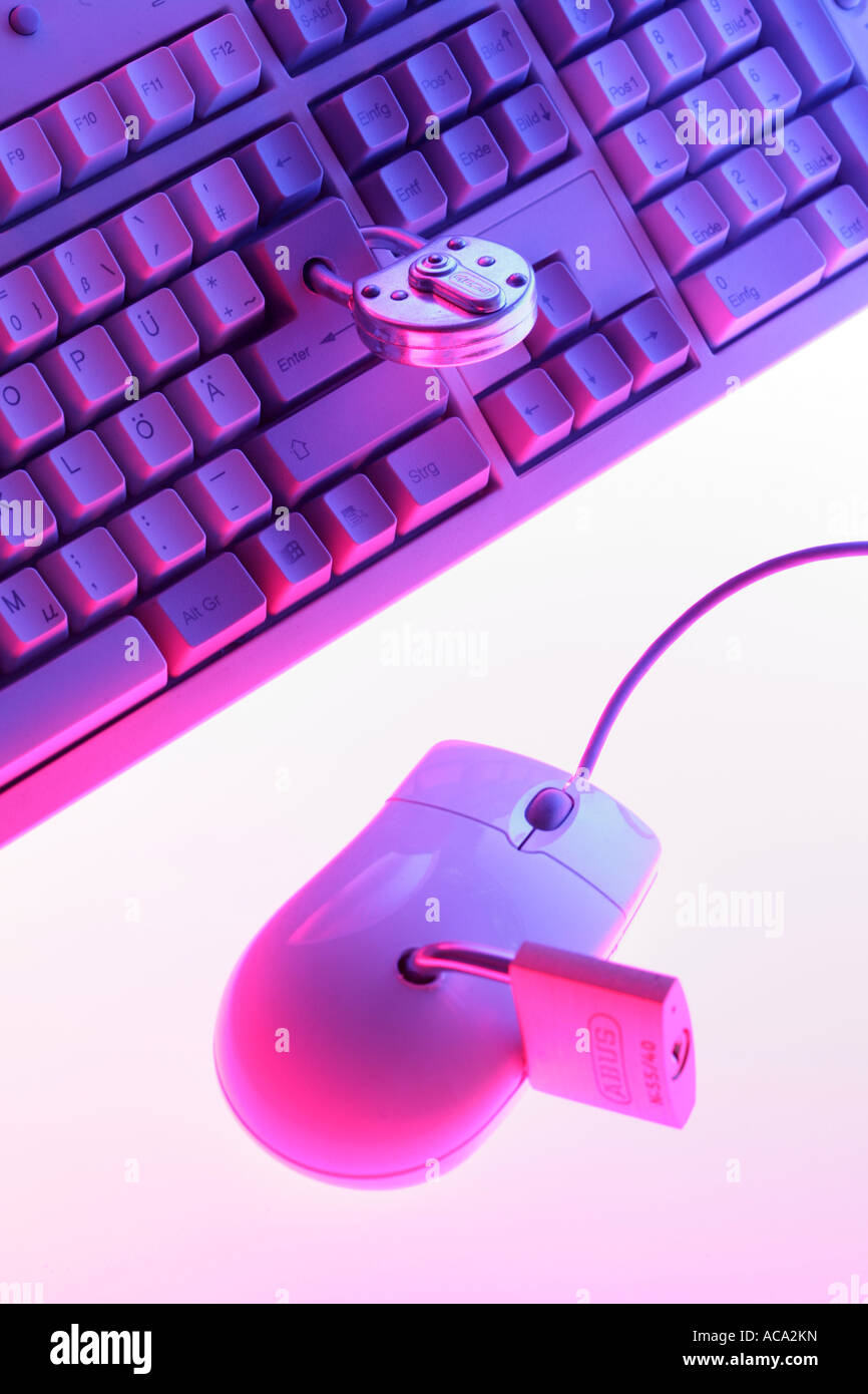 Symbolic photo, computer safety, Computer mouse and keyboard with lock ...