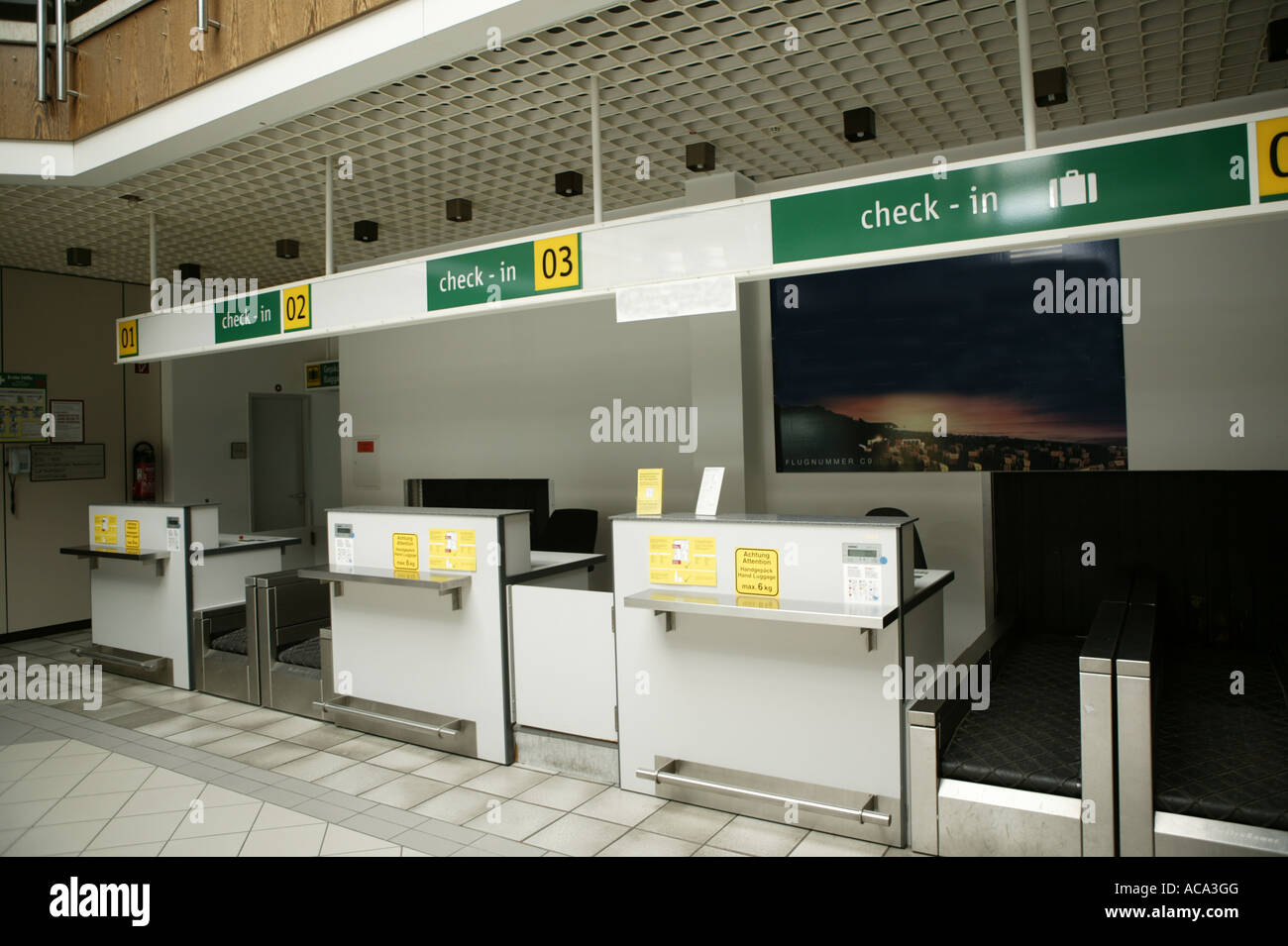 Empty check-in counter, airport Stock Photo - Alamy