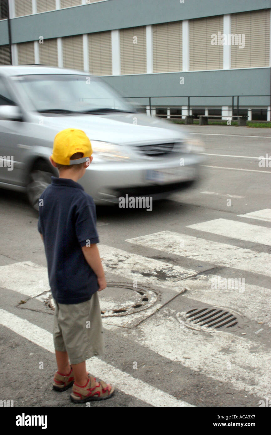 Child on a pedestrian crossing Stock Photo - Alamy