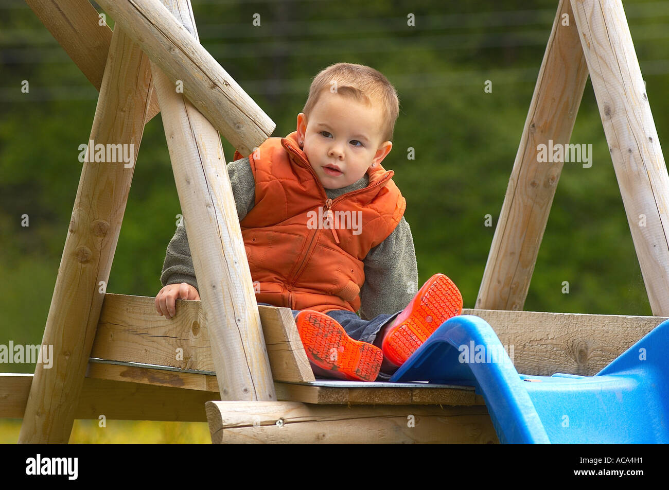 Child on a slideway Stock Photo - Alamy