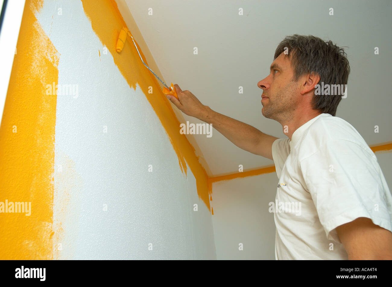 Man painting facade high rise building hi-res stock photography and ...