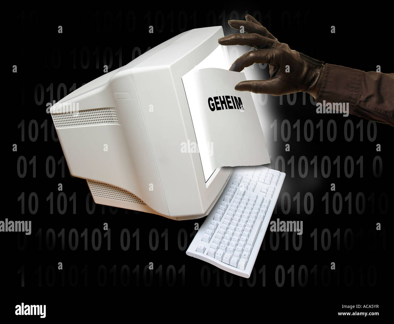 Hand with black glove reaches into a computer Stock Photo - Alamy