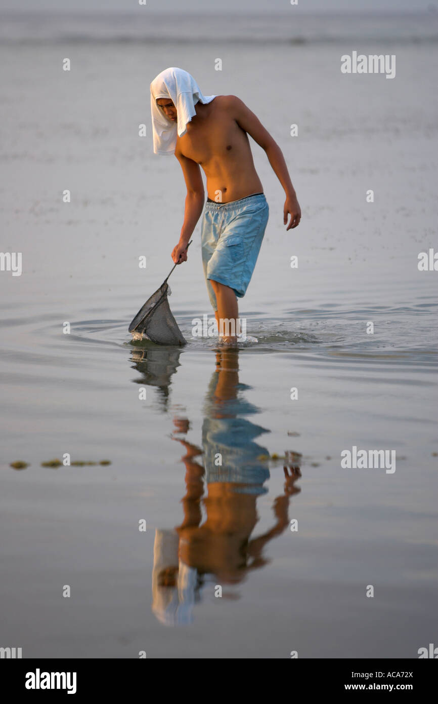 Fisherman with a fishing net, Philippines Stock Photo - Alamy