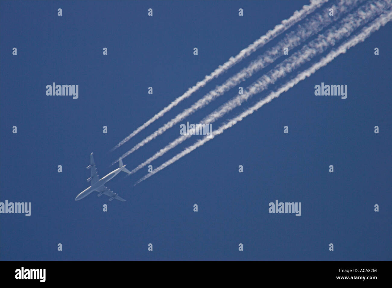 Vapour trails in the sky Stock Photo - Alamy