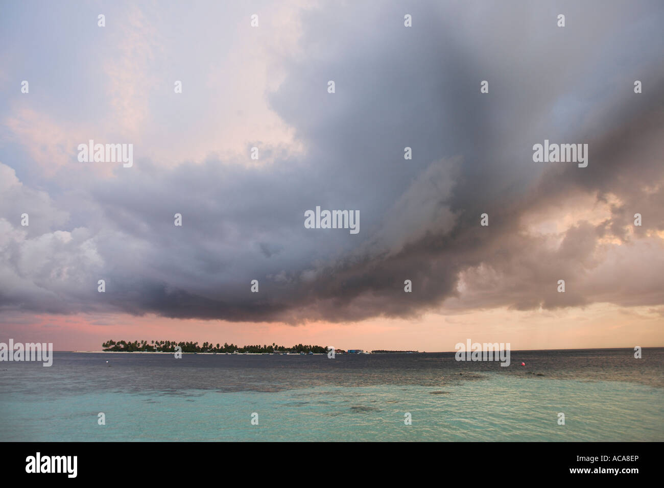 Thunderclouds above an island, Maledives Stock Photo - Alamy
