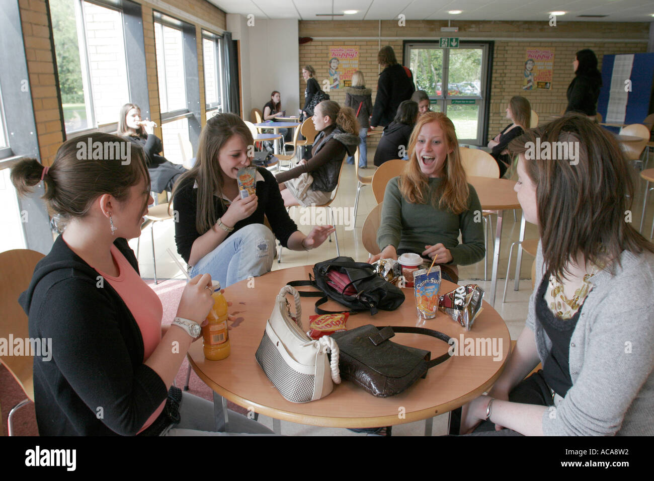 Girl Sixth form college students in college cafe Stock Photo - Alamy