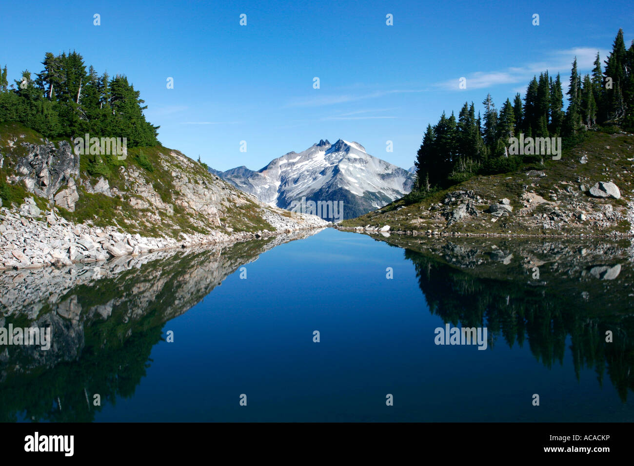Icey Peak above a high alpine lake North Cascades National Park ...