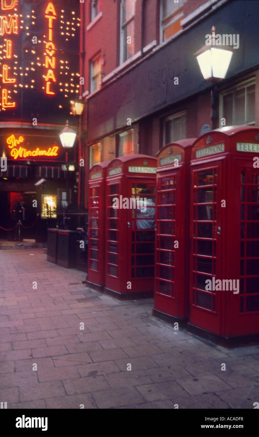 Red Telephone Boxes by night in Soho street London Stock Photo - Alamy
