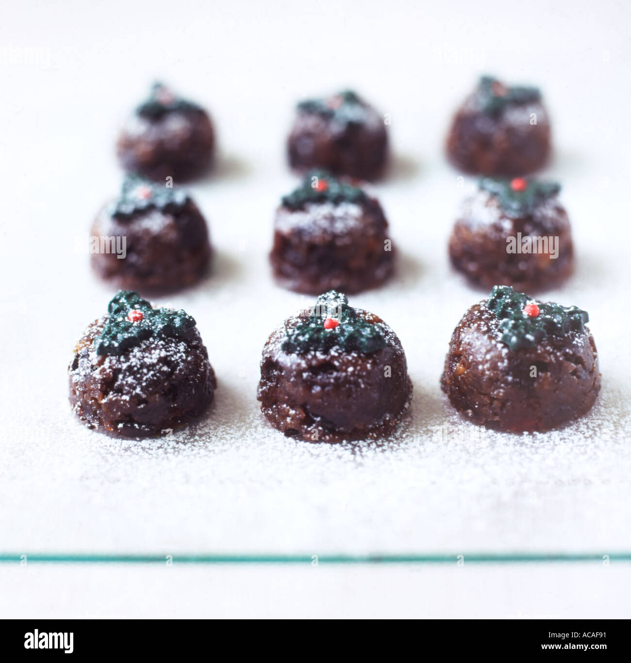 Mini Christmas puddings Stock Photo - Alamy