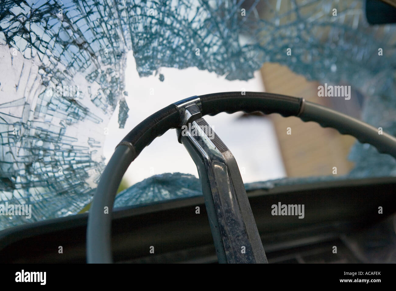 Aftermath of an automobile accident fatality shattered glass windshield ...