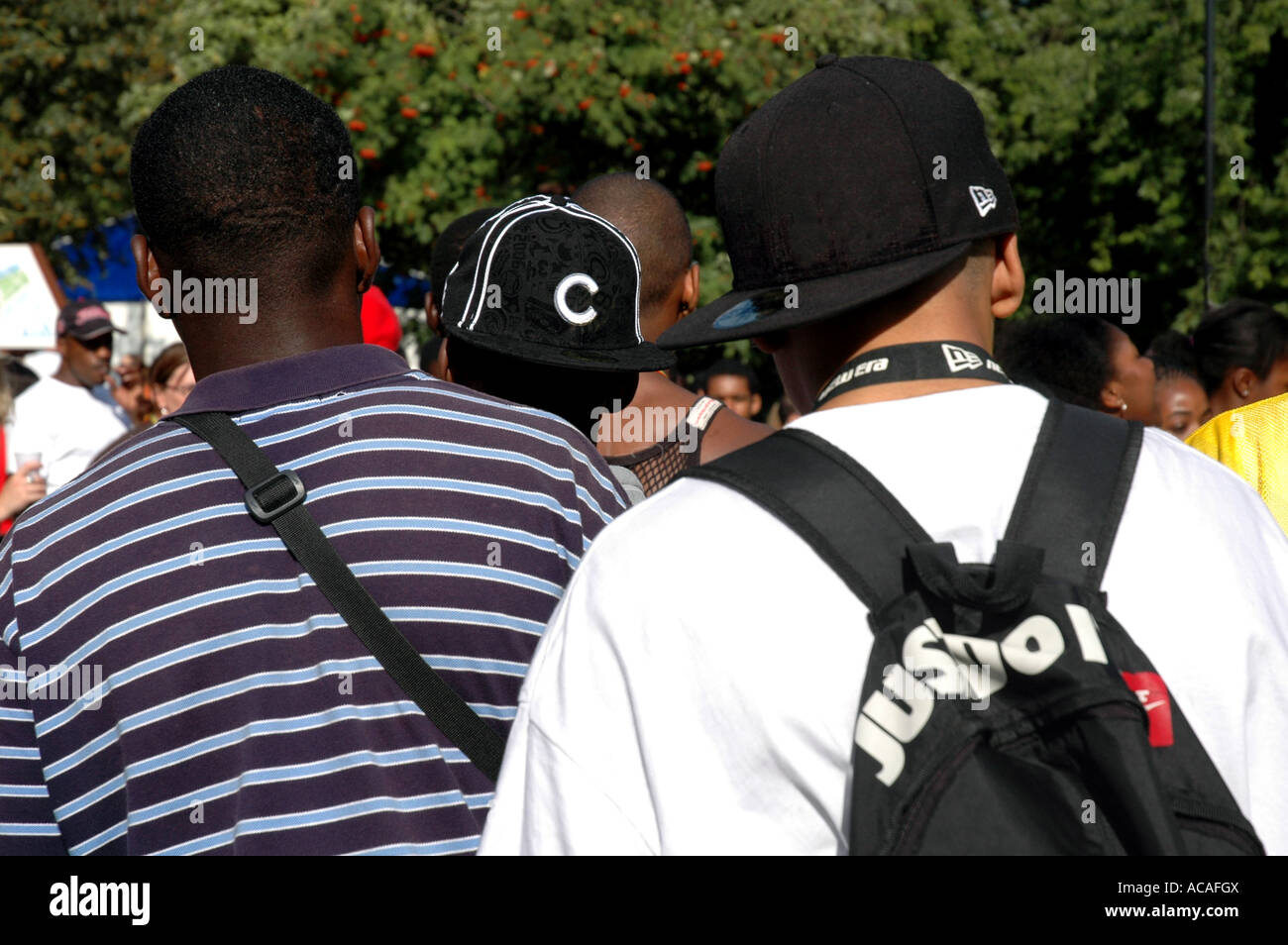 Back view of gang of lads in West London Stock Photo - Alamy