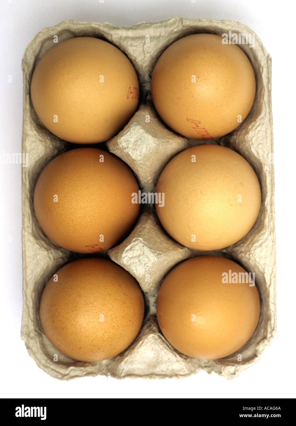 six eggs in egg box packaging Stock Photo - Alamy