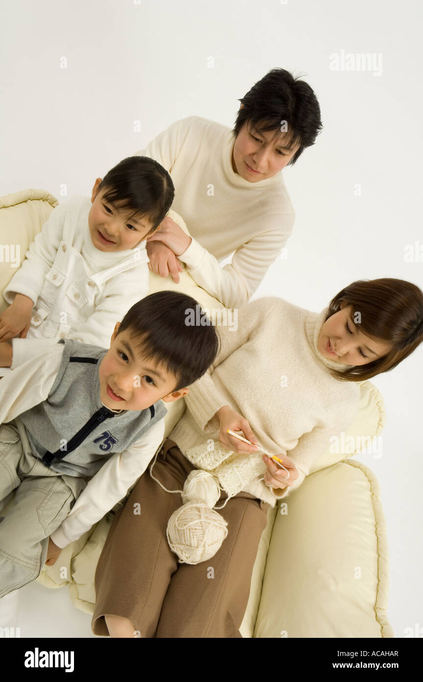Family with mother knitting Stock Photo - Alamy