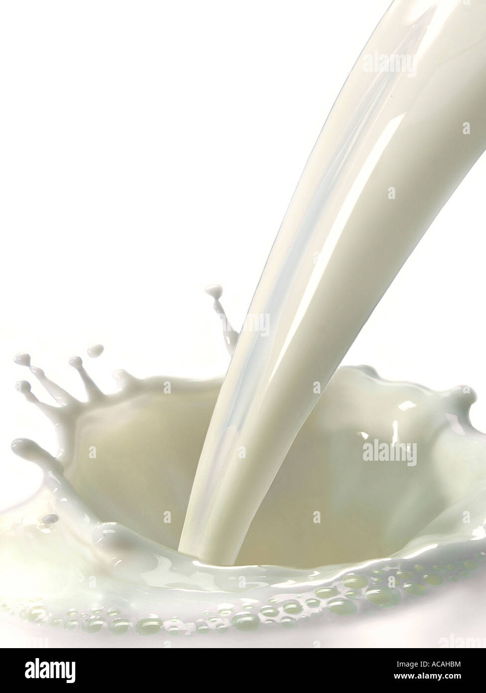 Spray of milk Stock Photo - Alamy