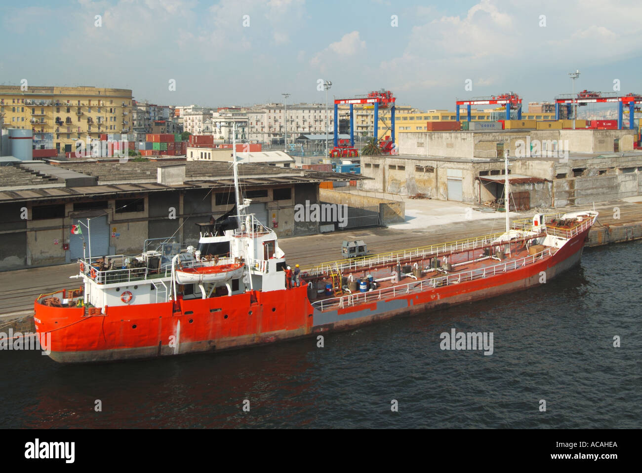 Naples port freighter alongside dock installations Stock Photo - Alamy