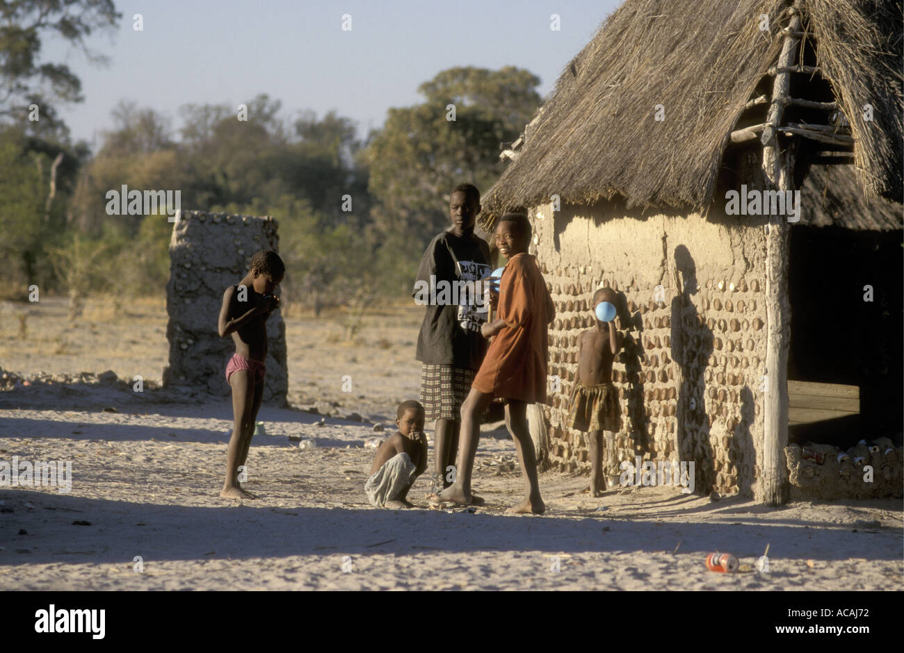 Tswana children playing outside their home Near Kwai Botswana southern ...
