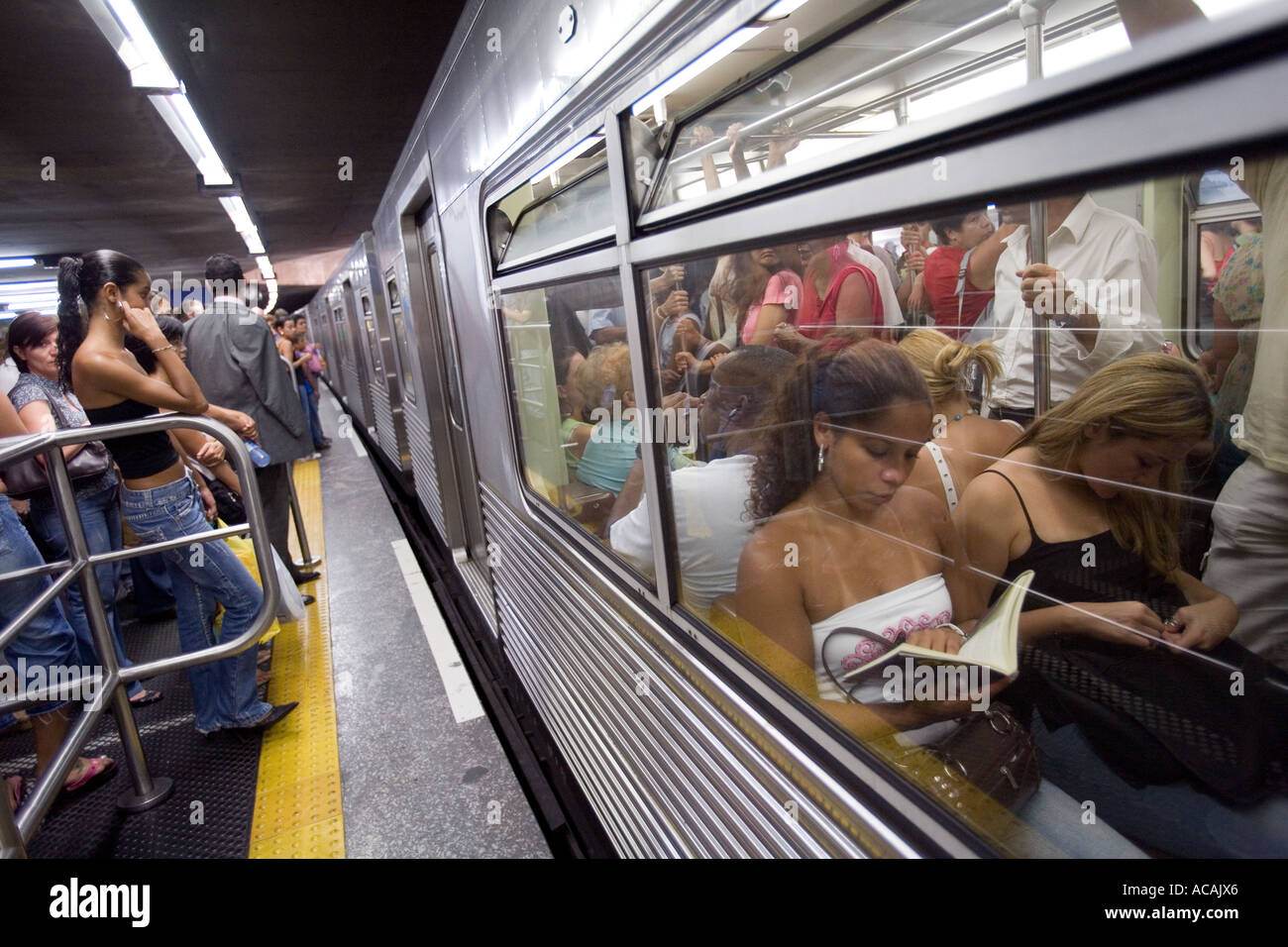 Train approaching the platform during rush hour Se tube station Sao ...
