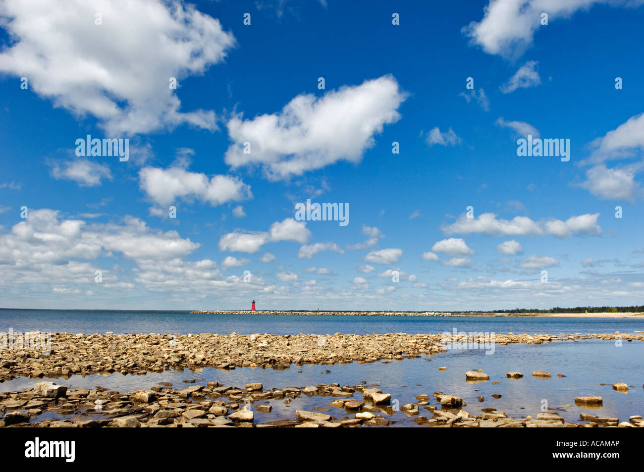 Rocks along Lake Michigan Shoreline with Manistique East Breakwater ...