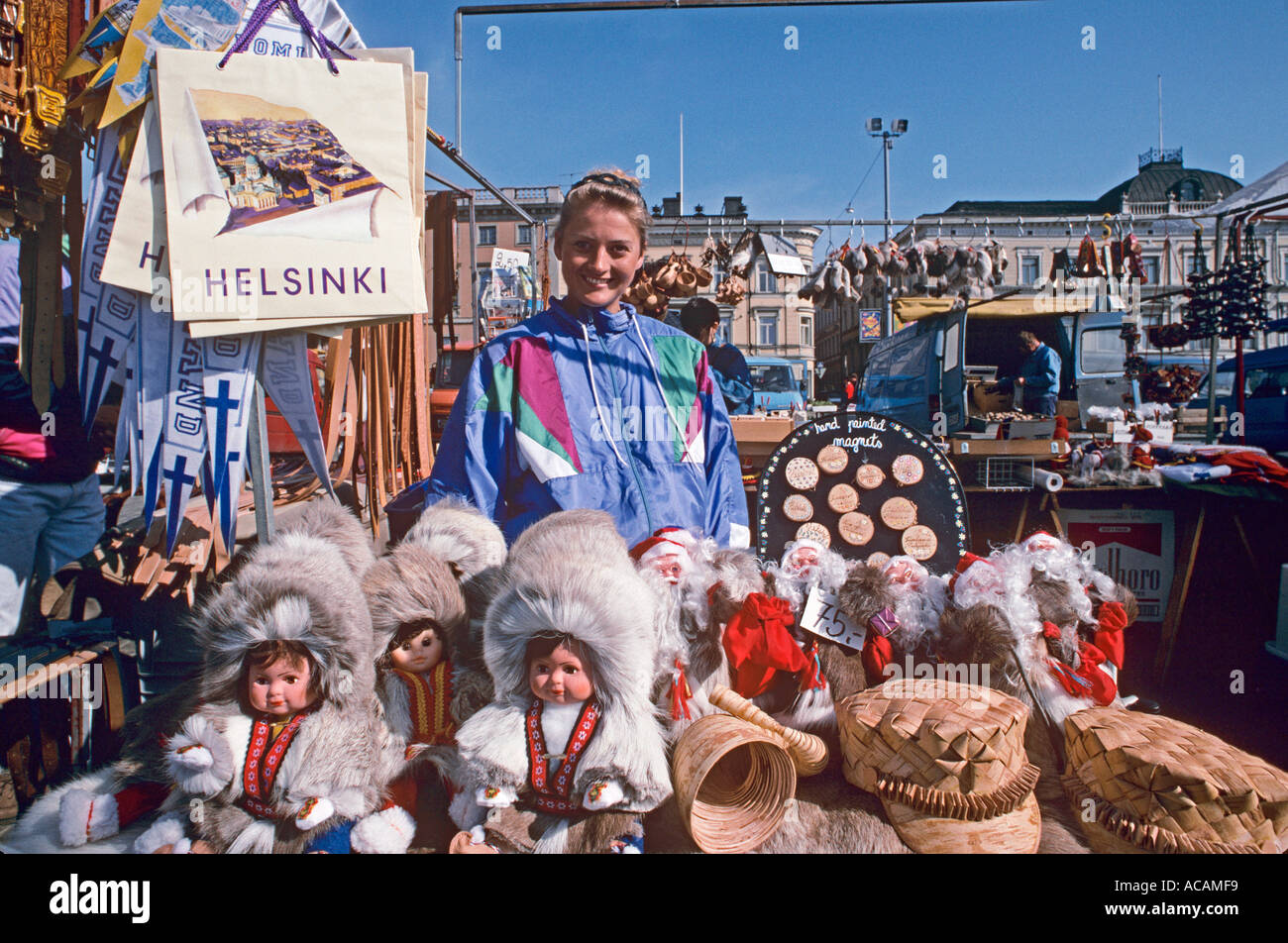 HELSINKI MARKET STALL Typical attractive happy Finnish blond girl poses ...