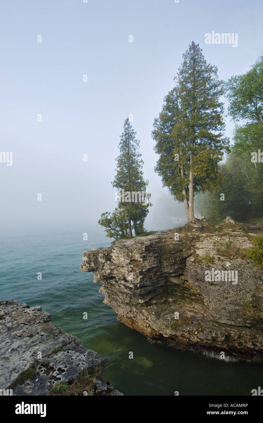 Rocky Cliffs and Approaching Morning Mist on Lake Michigan Cave Point ...