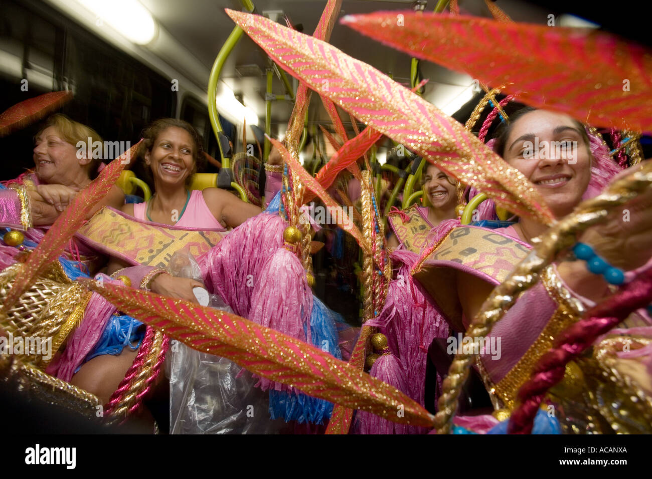 Participants from Rosa de Oro samba group sitting on the bus on their ...