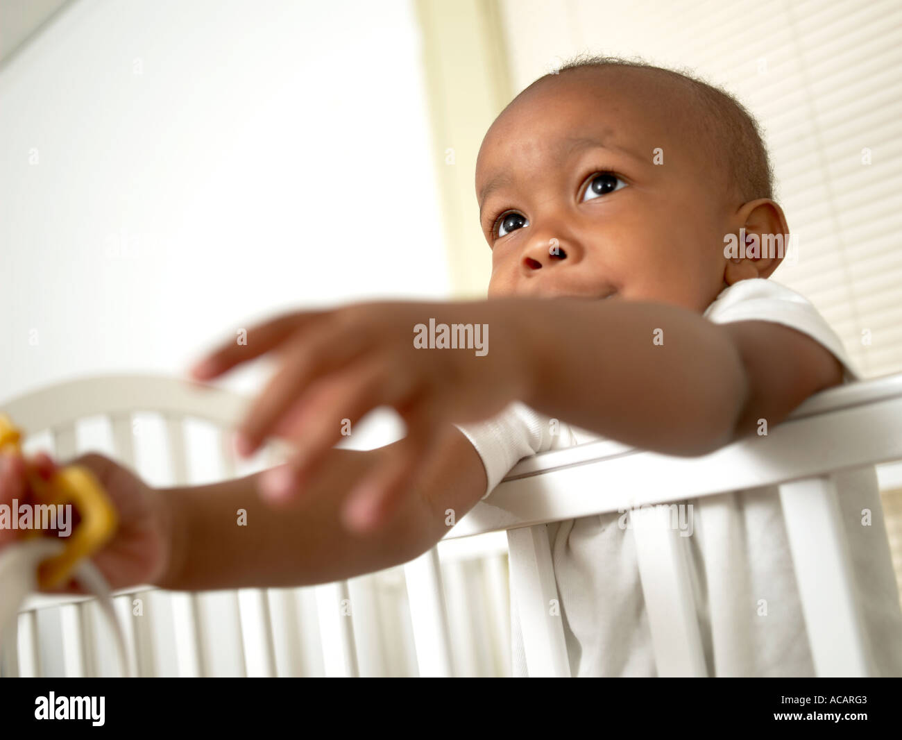 Baby reach arms hi-res stock photography and images - Alamy