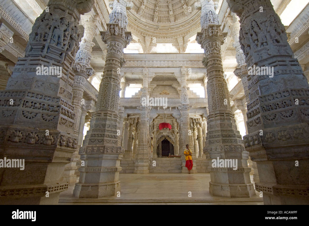 A wide angle view of a Jain priest relaxing inside the Adinatha Jain ...