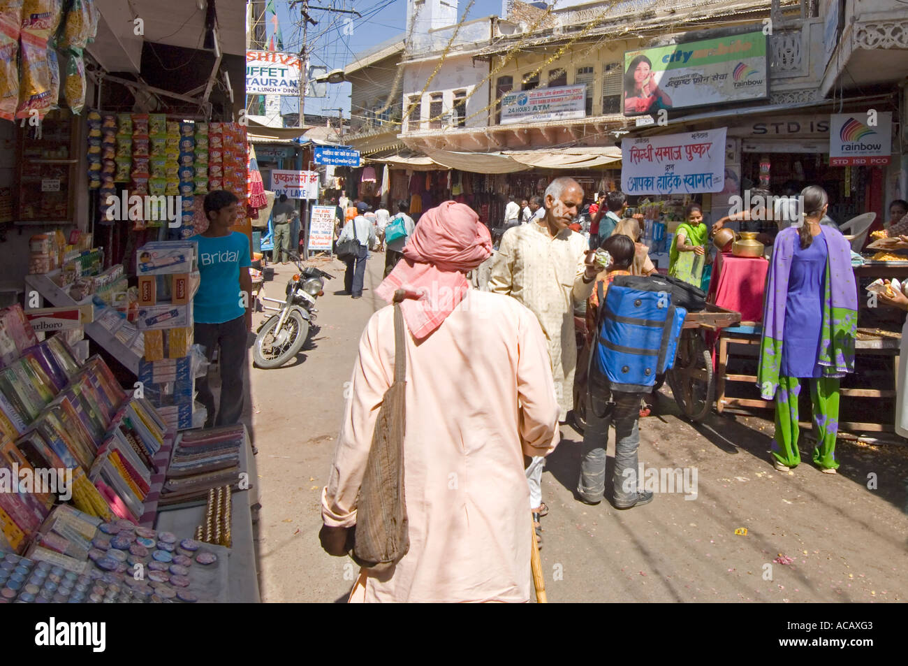Typical street scene of stalls and people along the Sadar Bazaar Road ...