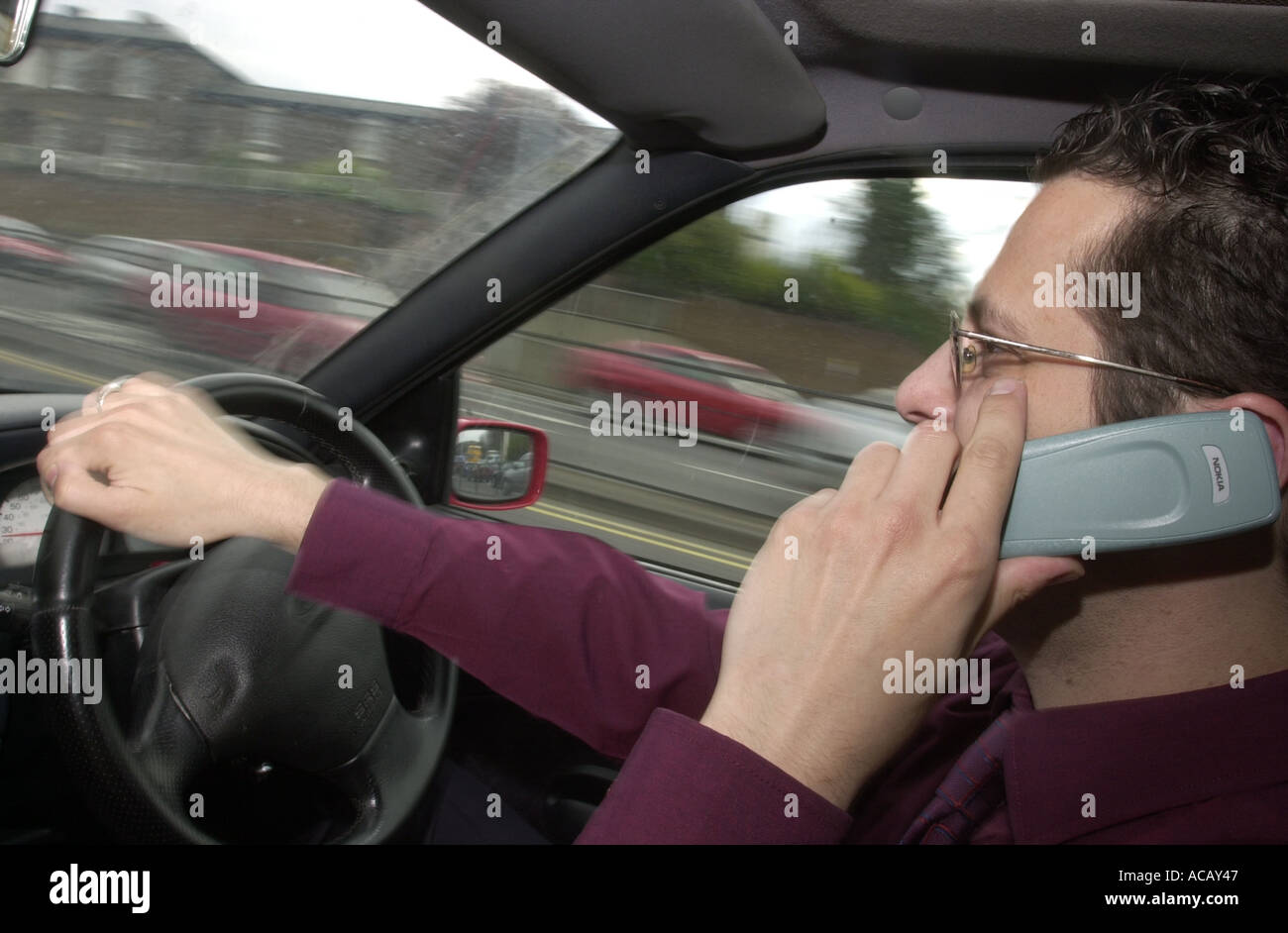 Driving whilst on a phone uk hi-res stock photography and images - Alamy