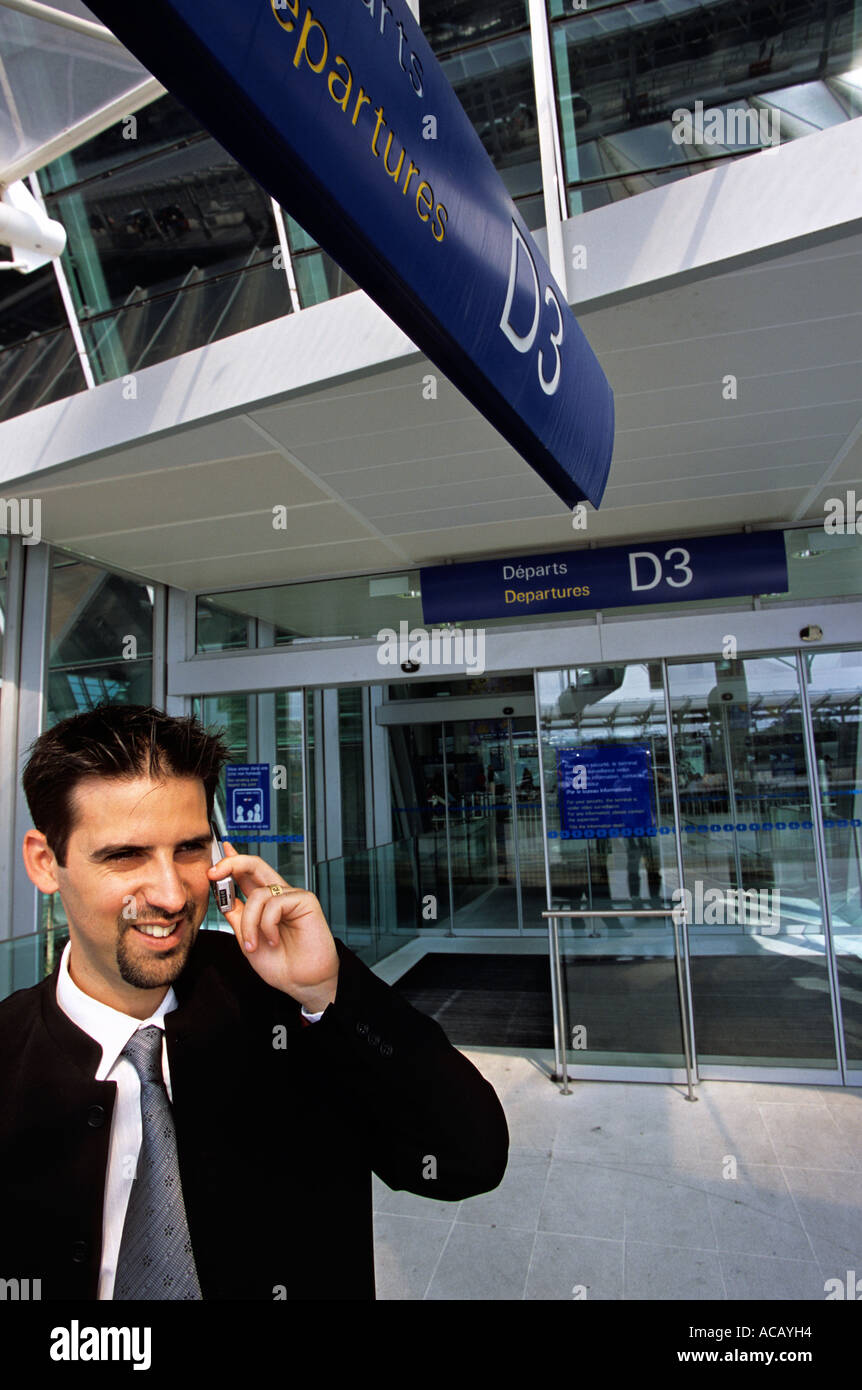Making a phone call from the airport Stock Photo - Alamy
