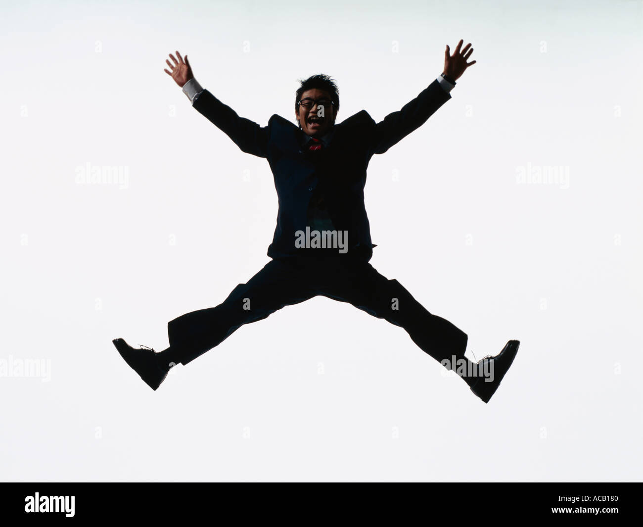 Business man jumping for joy hi-res stock photography and images - Alamy