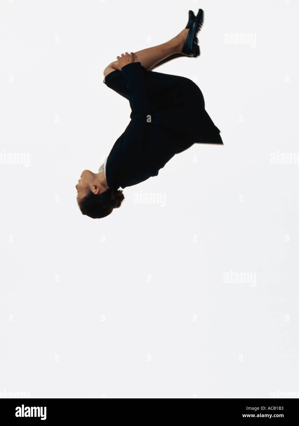 One business woman falling down hi-res stock photography and images - Alamy