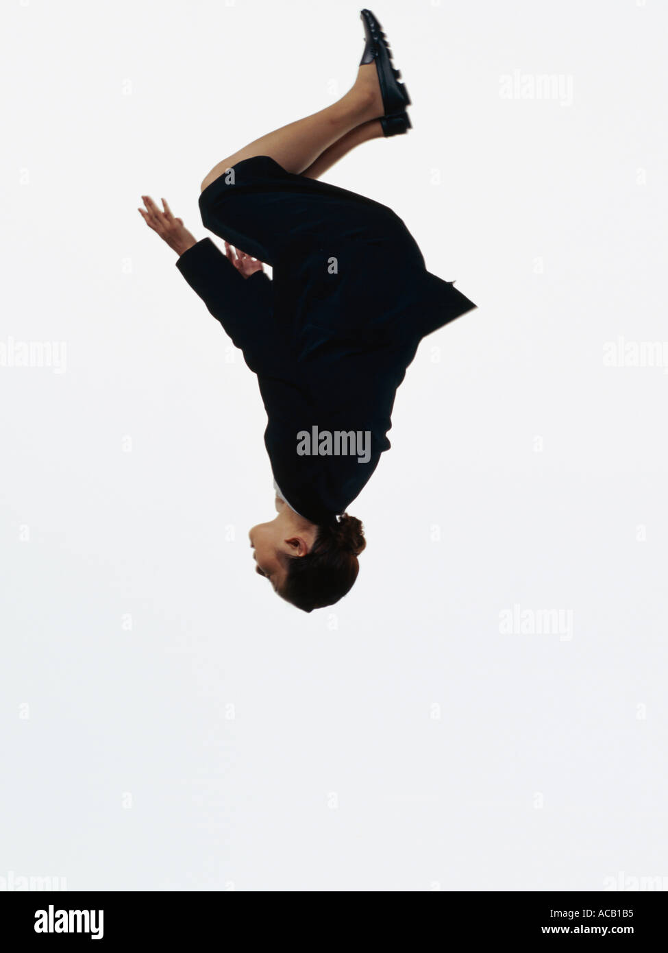 One business woman falling down hi-res stock photography and images - Alamy