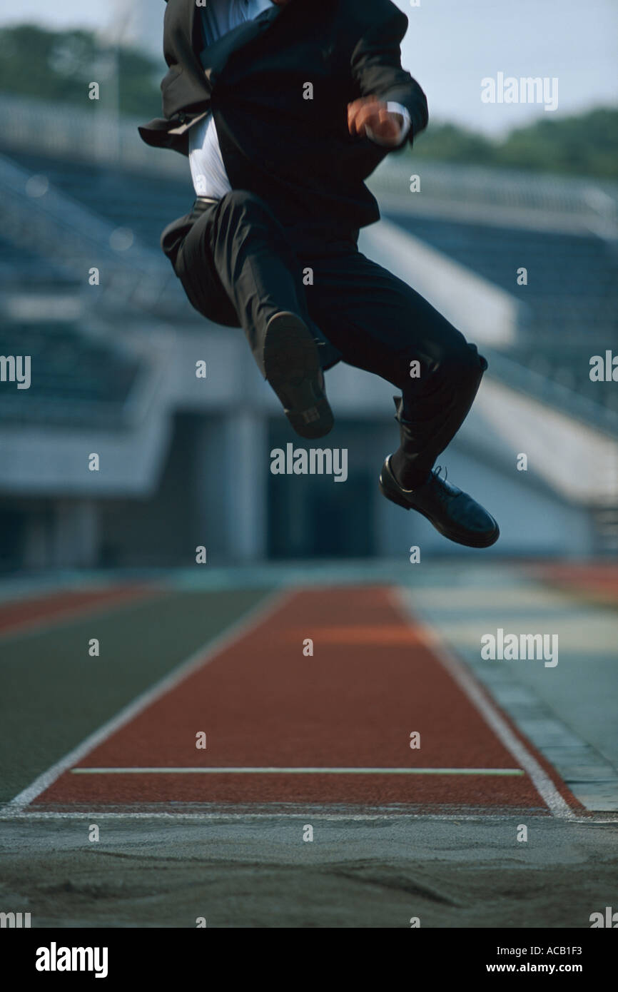 Businessman jump hi-res stock photography and images - Alamy