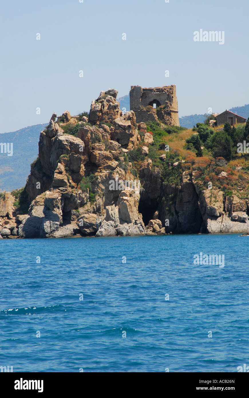Cefalu castle on a rocky outcrop looking over the Mediteranean sea on ...