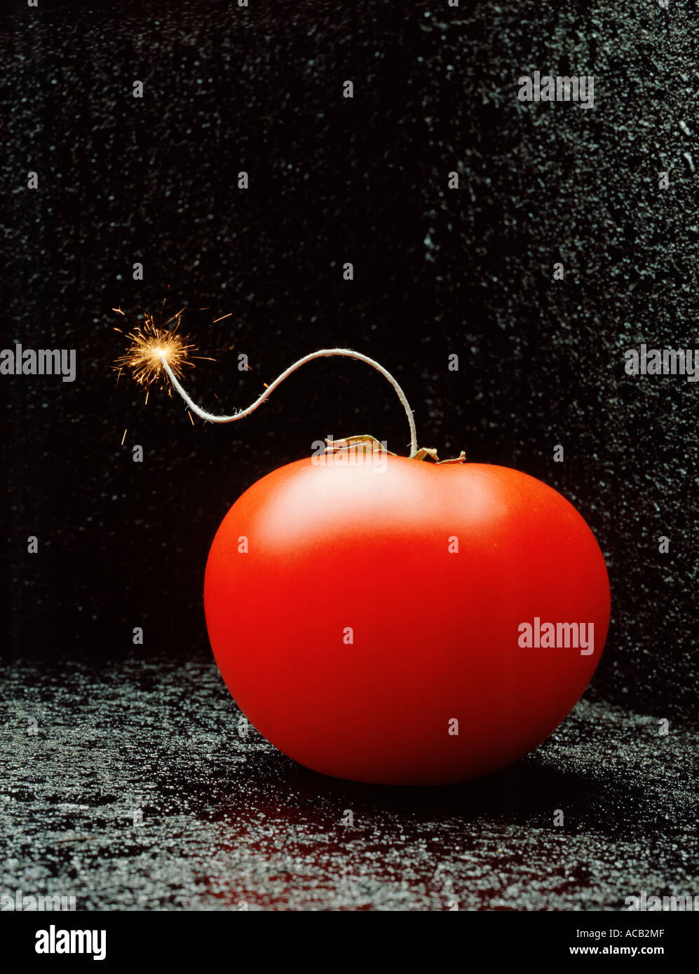 Tomato with lit fuse, bursting with flavor Stock Photo - Alamy