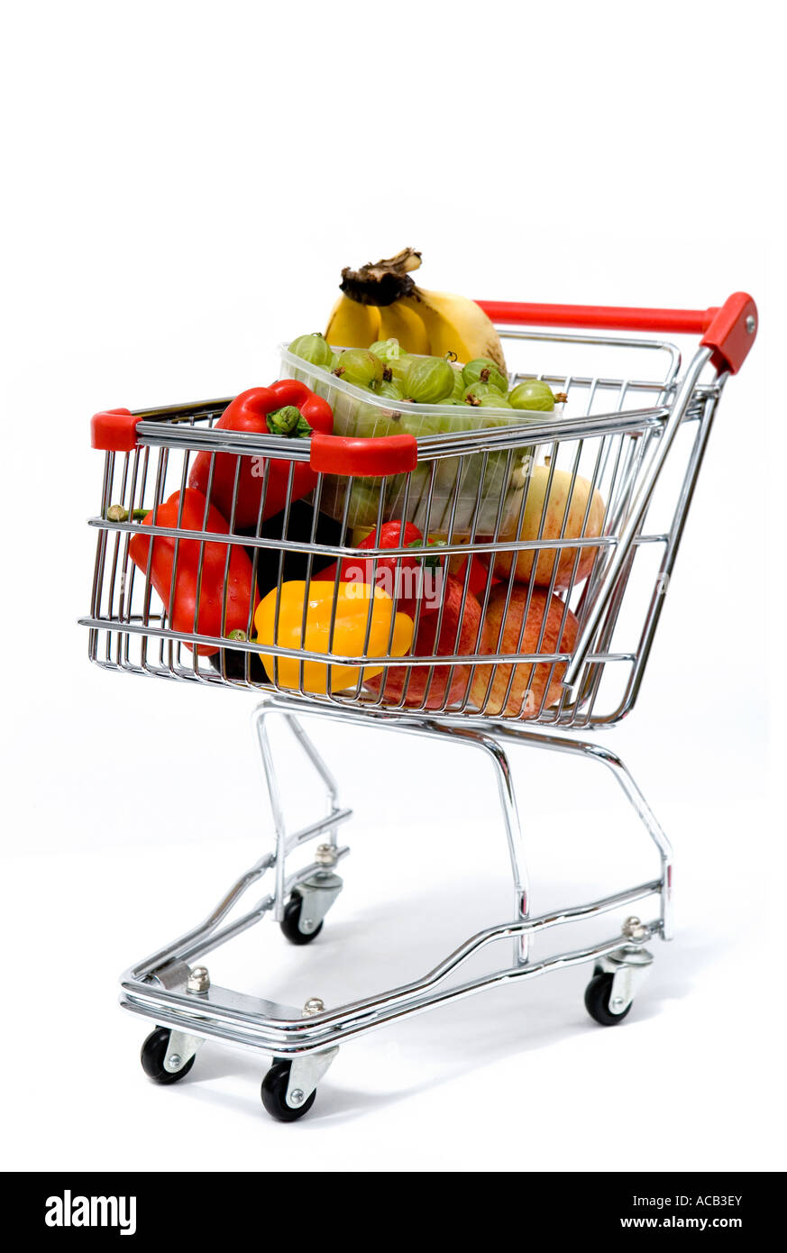 Mini shopping trolley filled with fruit and vegetables Stock Photo - Alamy