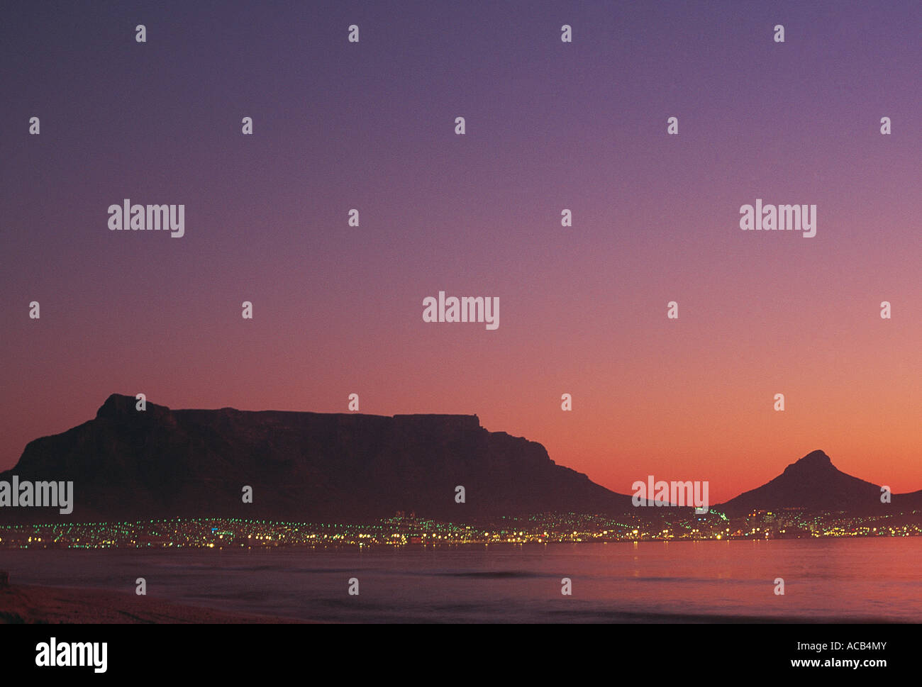 Evening view of Table Mountain and Cape Town city lights from Milnerton ...