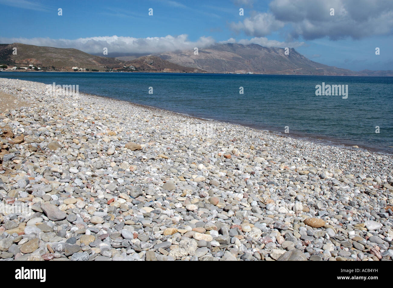 Stony beach over Mediterranean Sea in Kissamos (Kastelli) town, greek ...