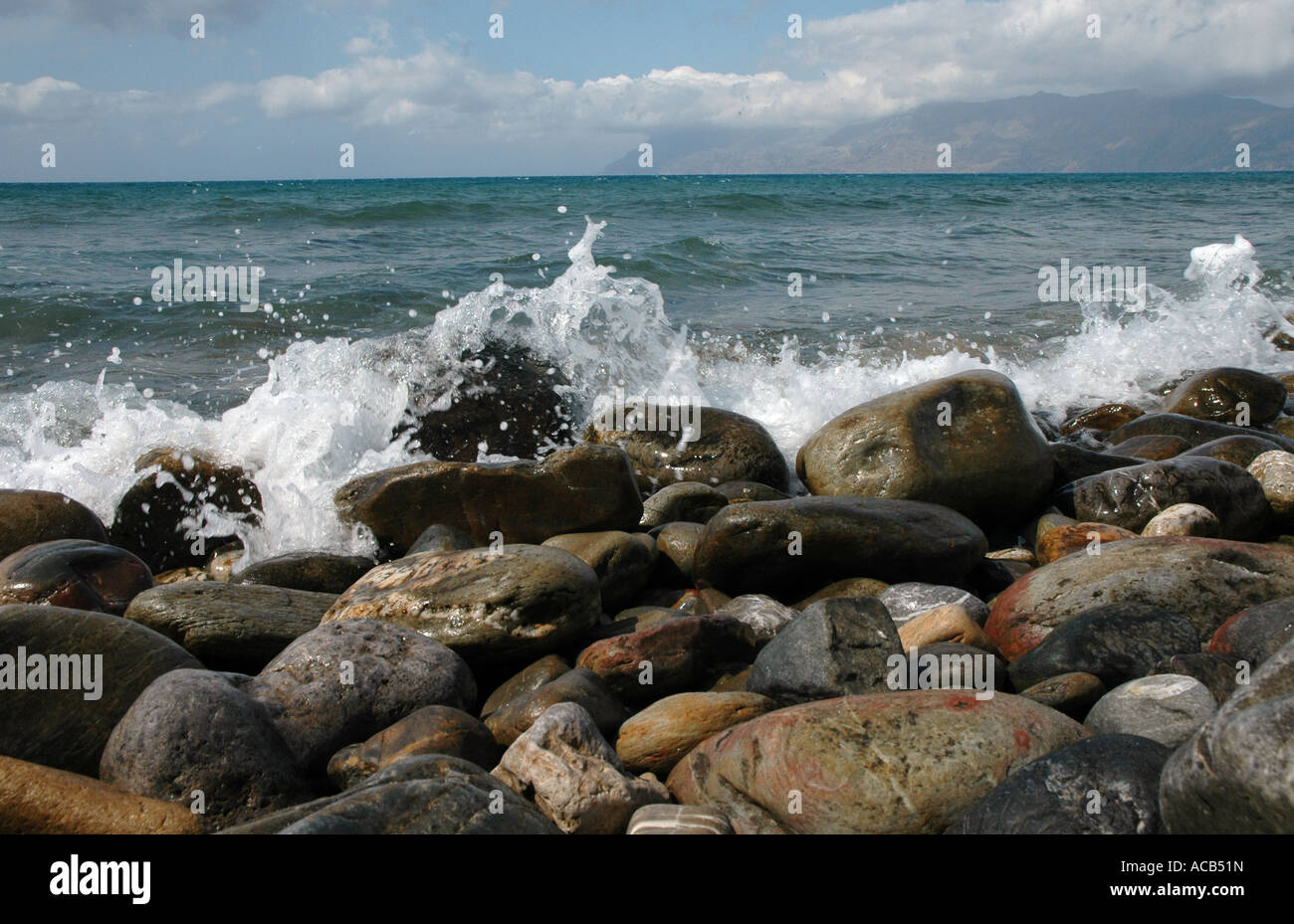 Stony beach over Mediterranean Sea in Kissamos town on island of Crete ...