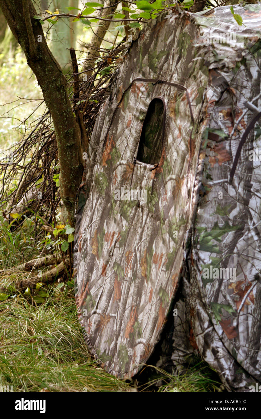 Bird hide set up amongst trees in a wood, UK Stock Photo - Alamy