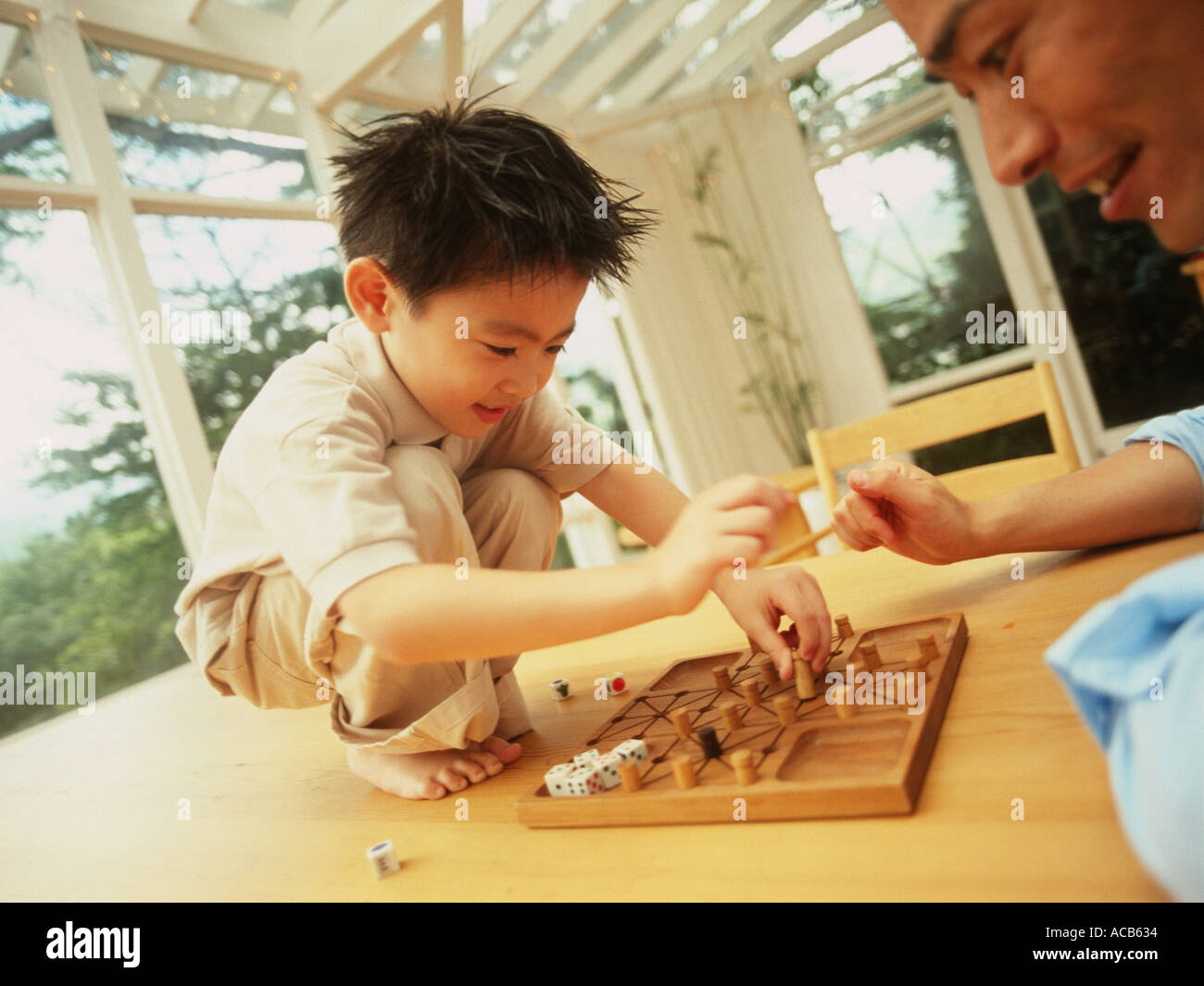 Weekend Family At Home Stock Photo - Alamy