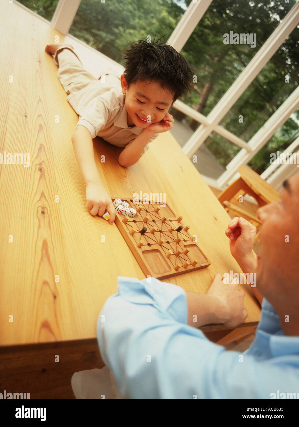 Weekend Family At Home Stock Photo - Alamy