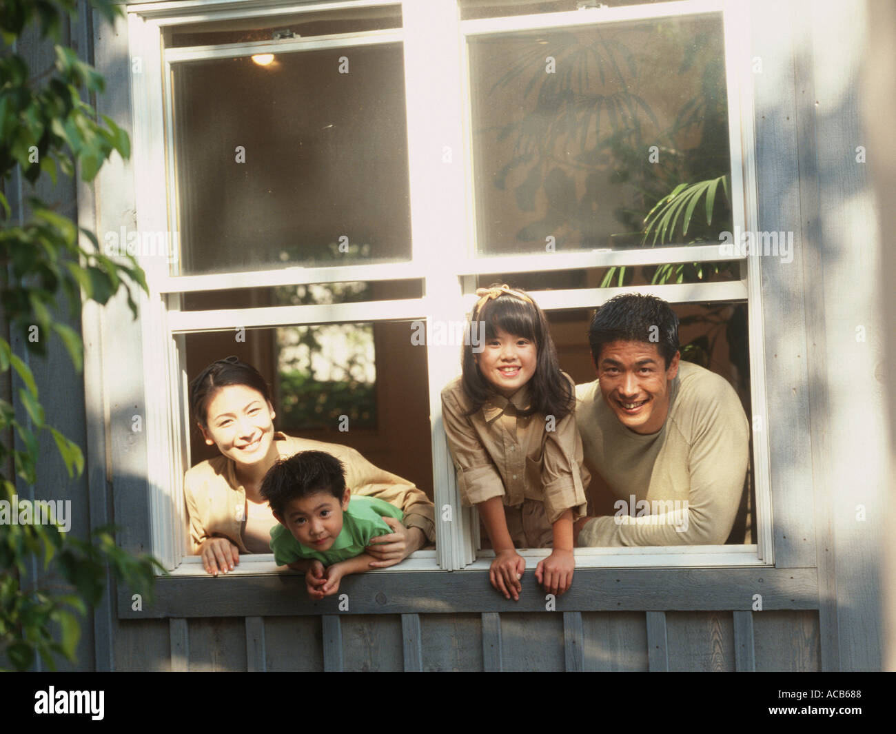 Weekend Family At Home Stock Photo - Alamy