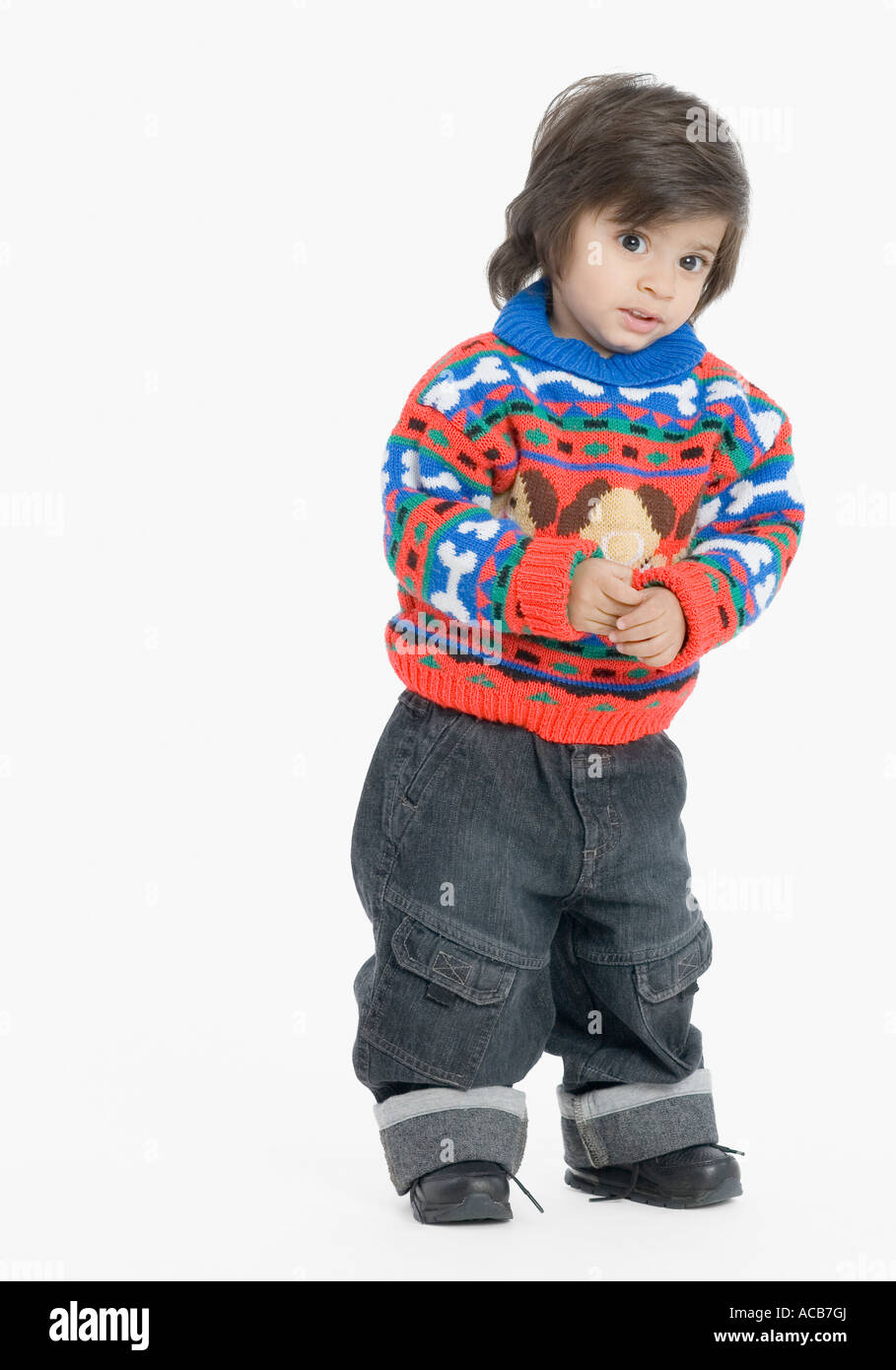 Boy standing and looking away Stock Photo - Alamy