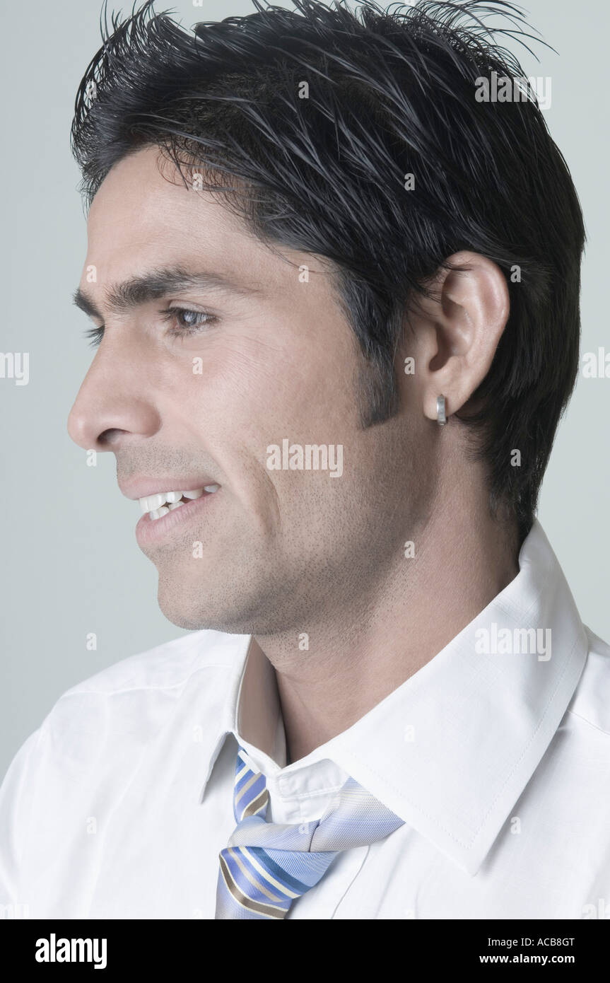 Side profile of a businessman smiling Stock Photo - Alamy