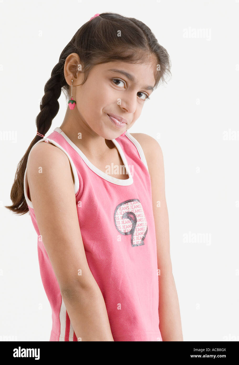 Portrait of a girl smirking Stock Photo - Alamy