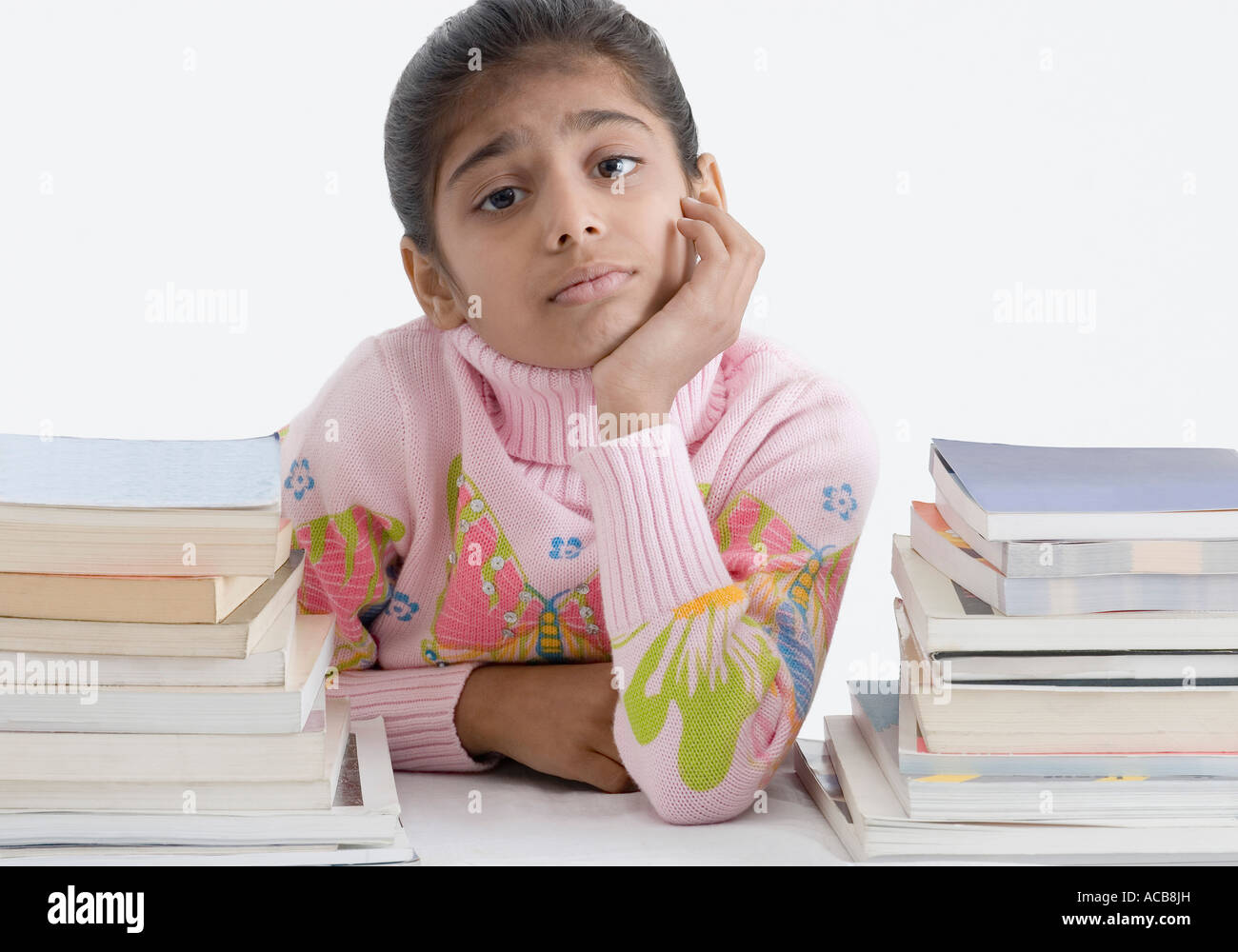 Child leaning over desk hi-res stock photography and images - Alamy
